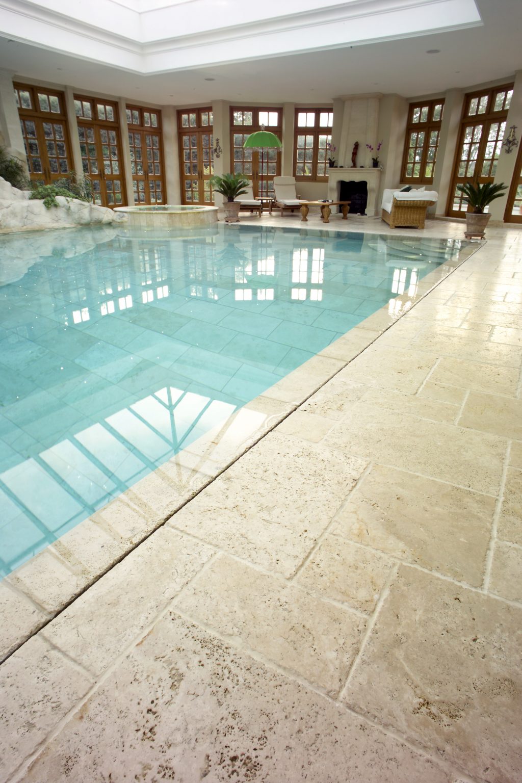 Tumbled Travertine surround with Honed & Filled Travertine inside pool ...